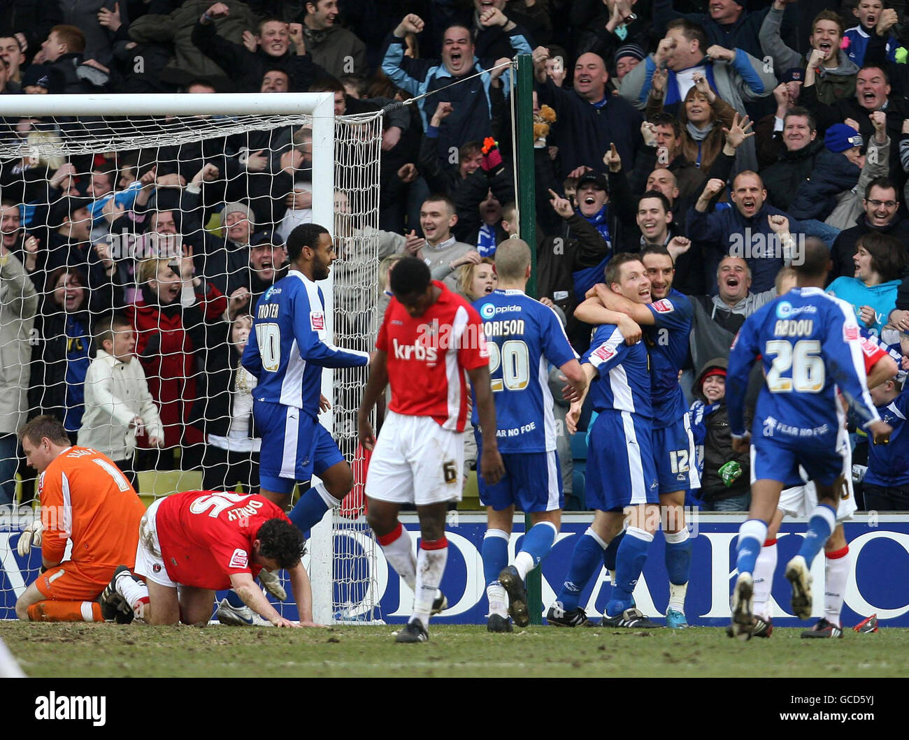 Millwall's players celebrate the second goal, an own goal by Charlton ...
