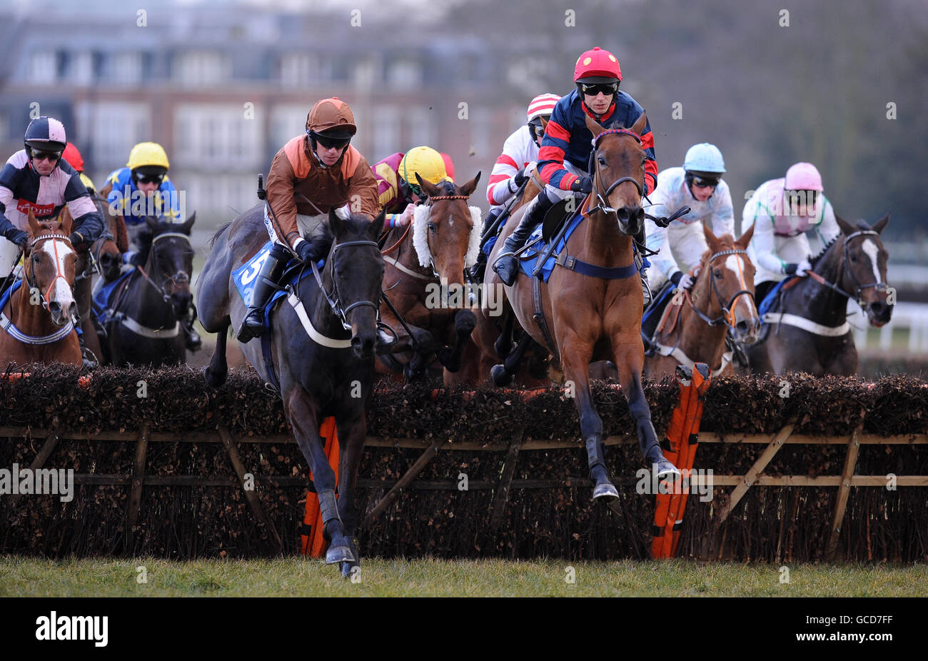 Runners and Riders jumps during the Charles Stanley Handicap Hurdle ...