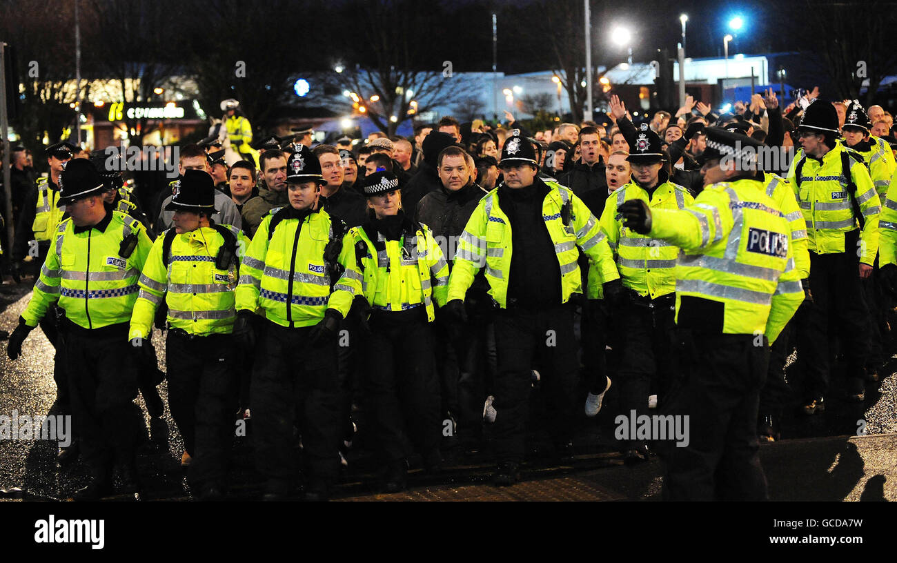 A heavy police presence keep the Millwall and Leeds United fans apart ...