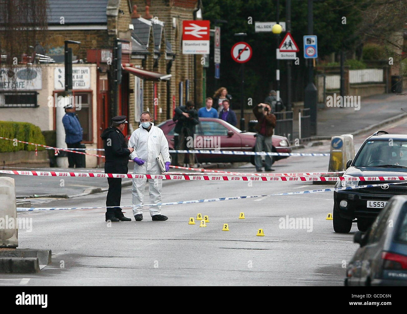 Scenes of Crime Officers (SOCO) at work at the scene of a stabbing near ...