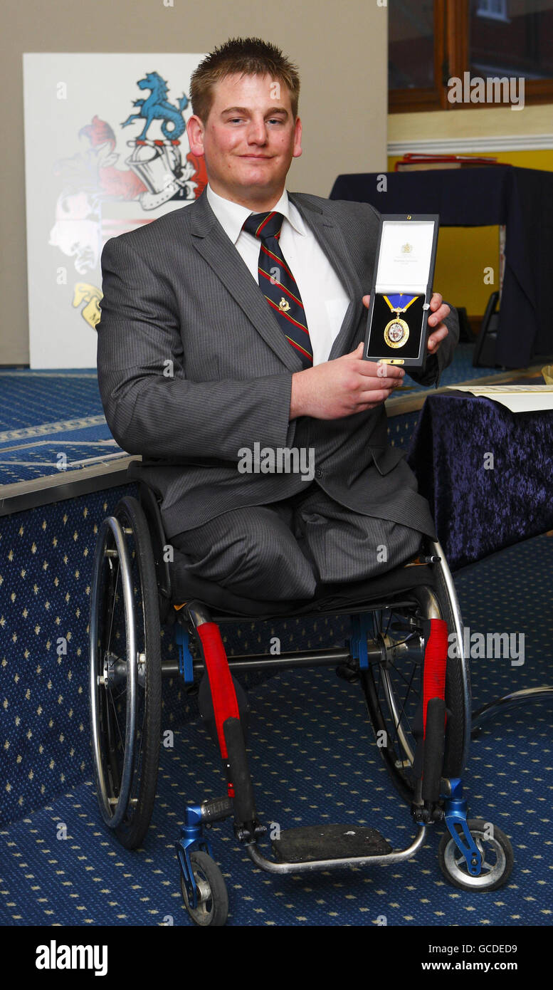 Royal Marine Joe Townsend, 21, proudly shows of his award of the ...