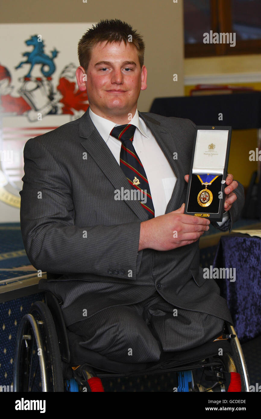 Royal Marine Joe Townsend, 21, proudly shows of his award of the ...
