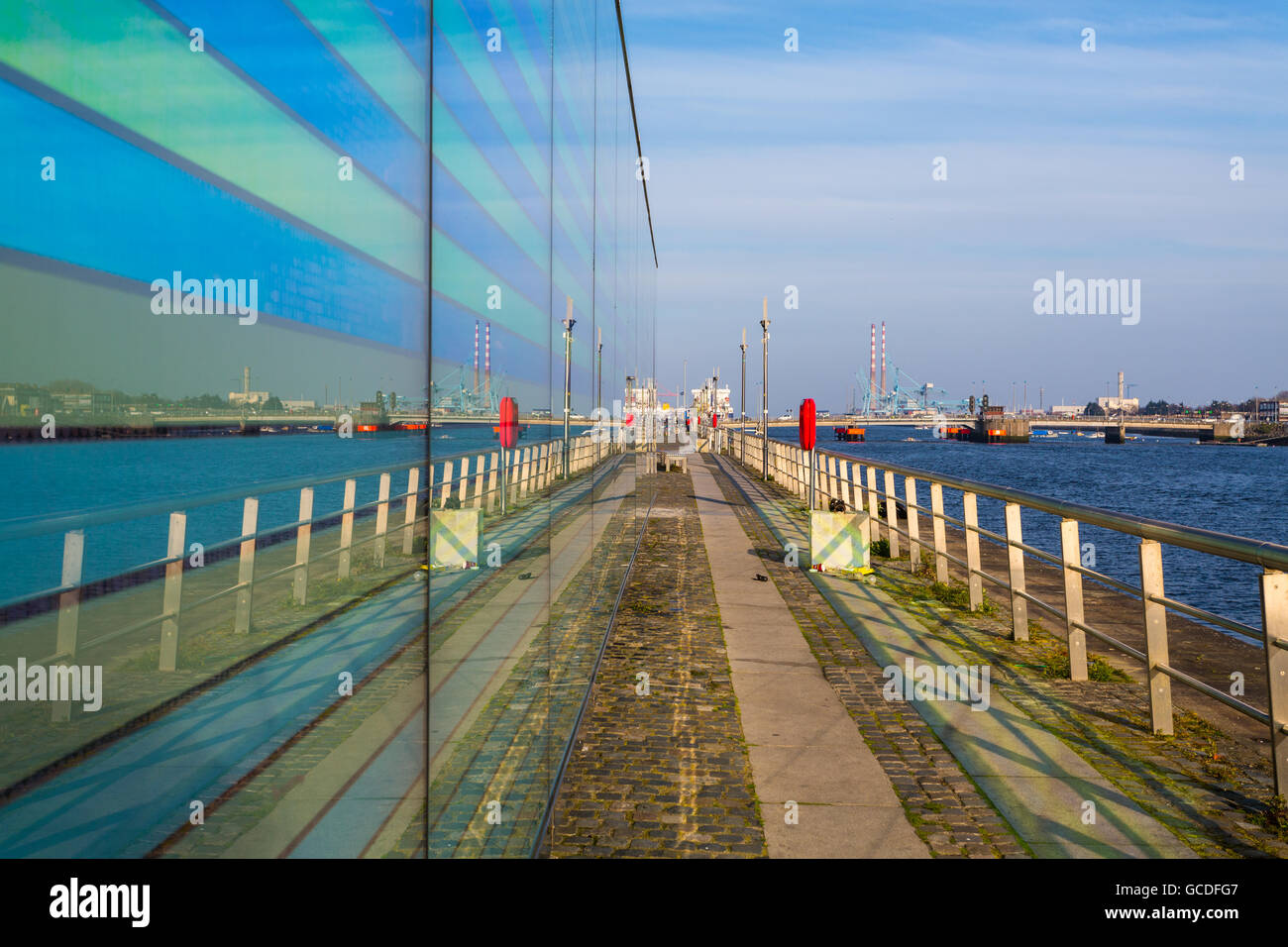 A colourful building reflected in the Dublin Docklands in Dublin ...