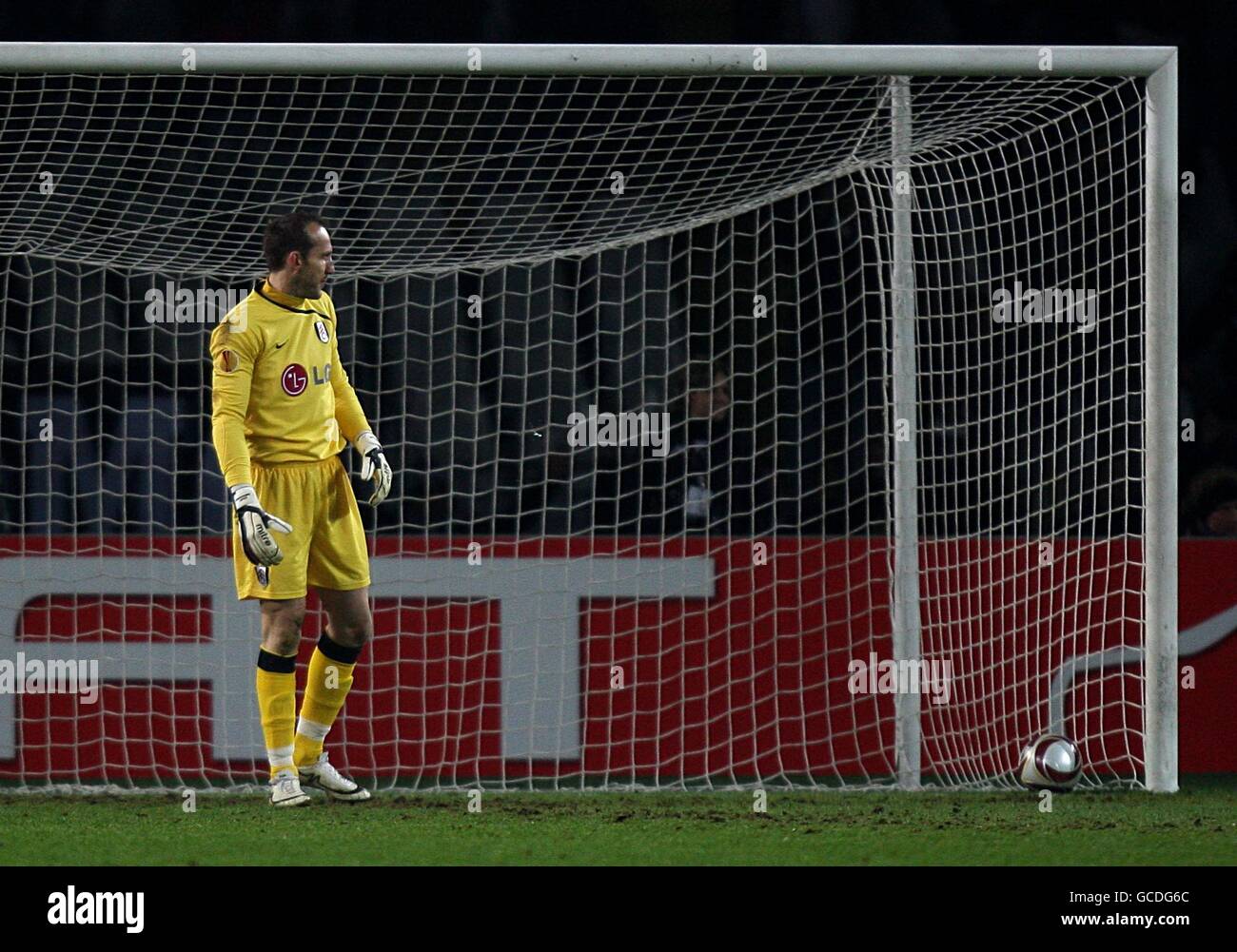 Fulham goalkeeper Mark Schwarzer stands dejected after Juventus ...