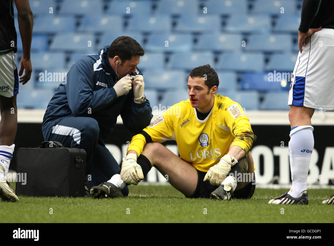 Sheffield Wednesday goalkeeper Chris Weale receives treatment for a ...