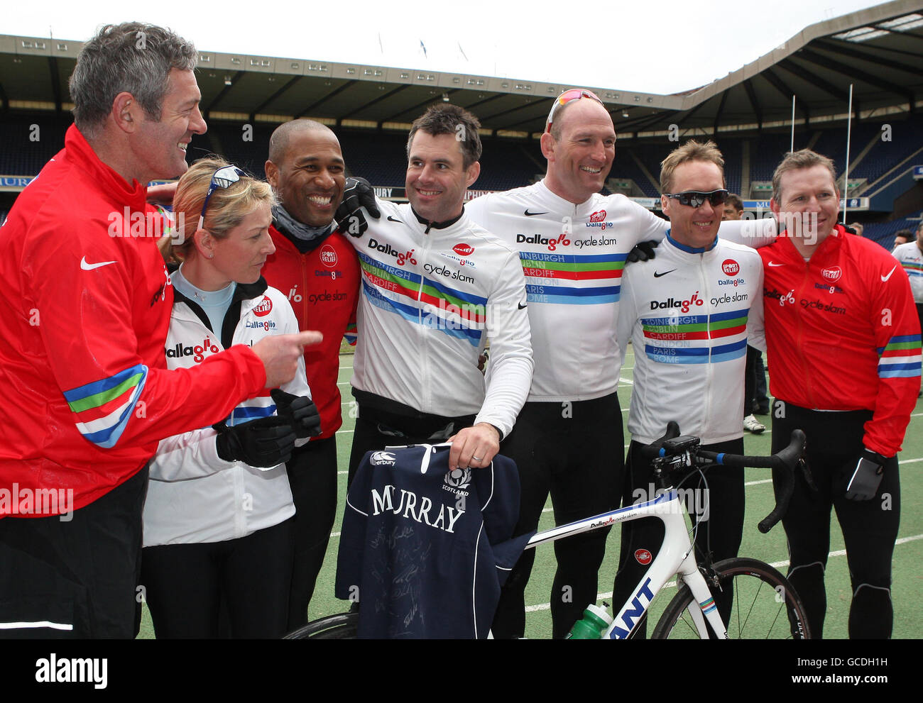 Lawrence Dallaglio (third right) celebrates completing his Charity bike ...