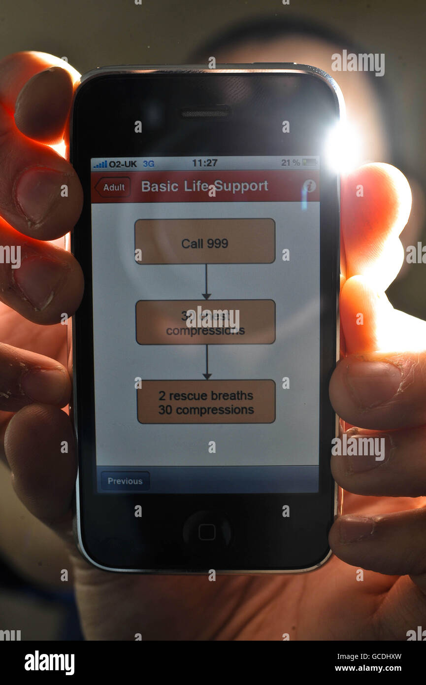 Developer of the iResus app, Dr Daniel Low holds his iPhone at the ...