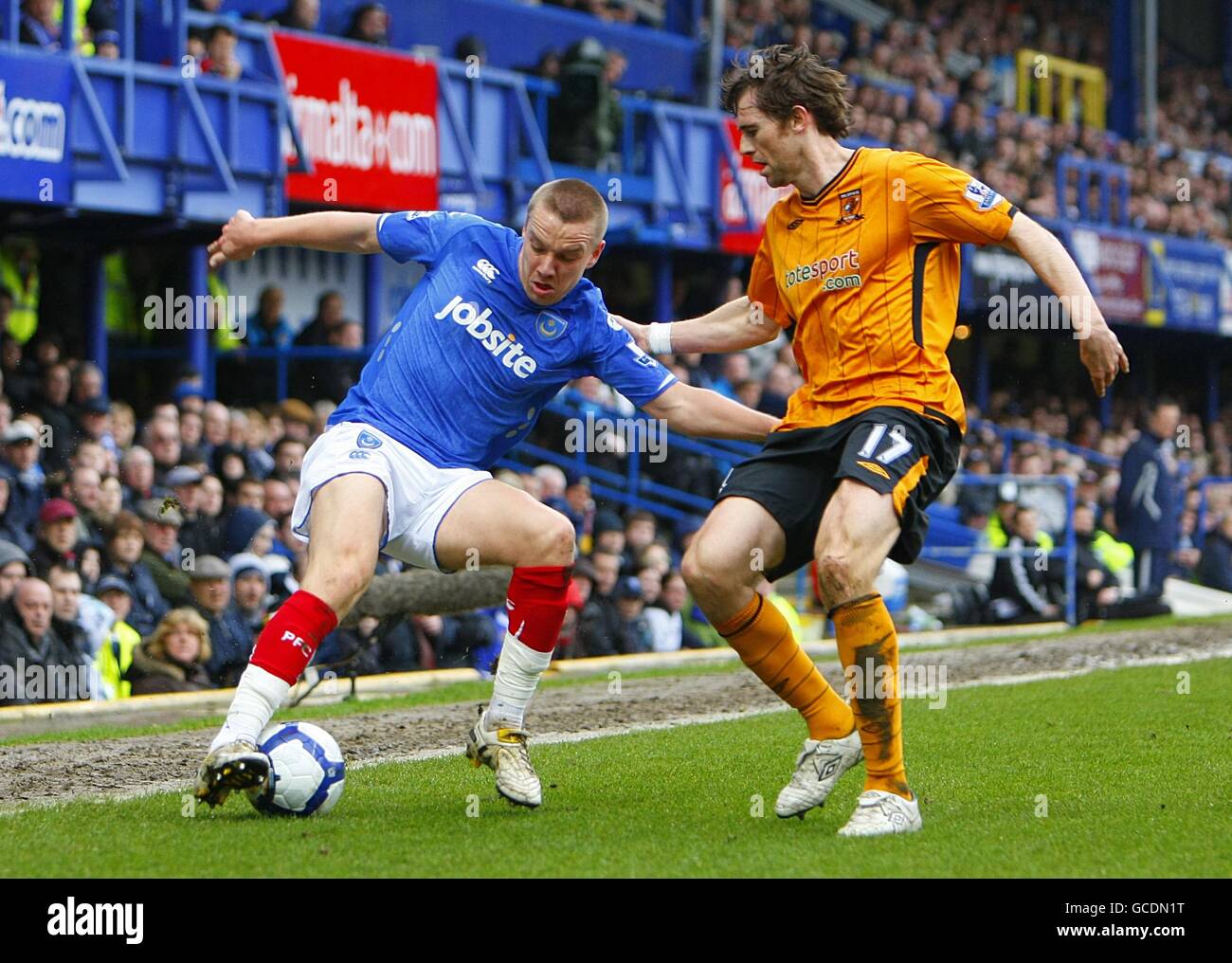 Portsmouth's Jamie O'Hara (left) and Hull City's Kevin Kilbane (right ...