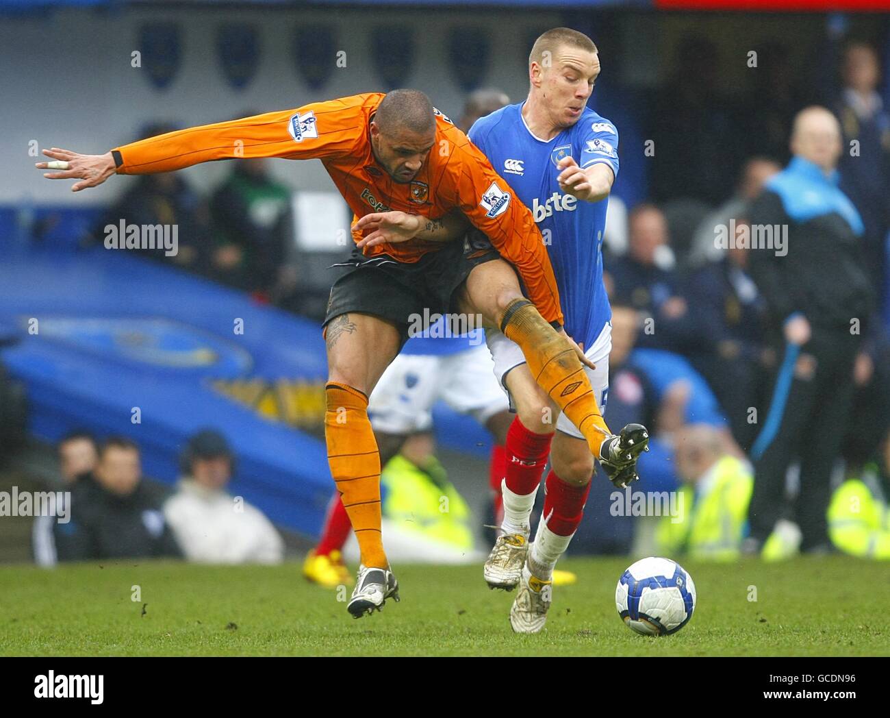 Hull City's Caleb Folan (left) and Portsmouth's Jamie O'Hara (right) in ...