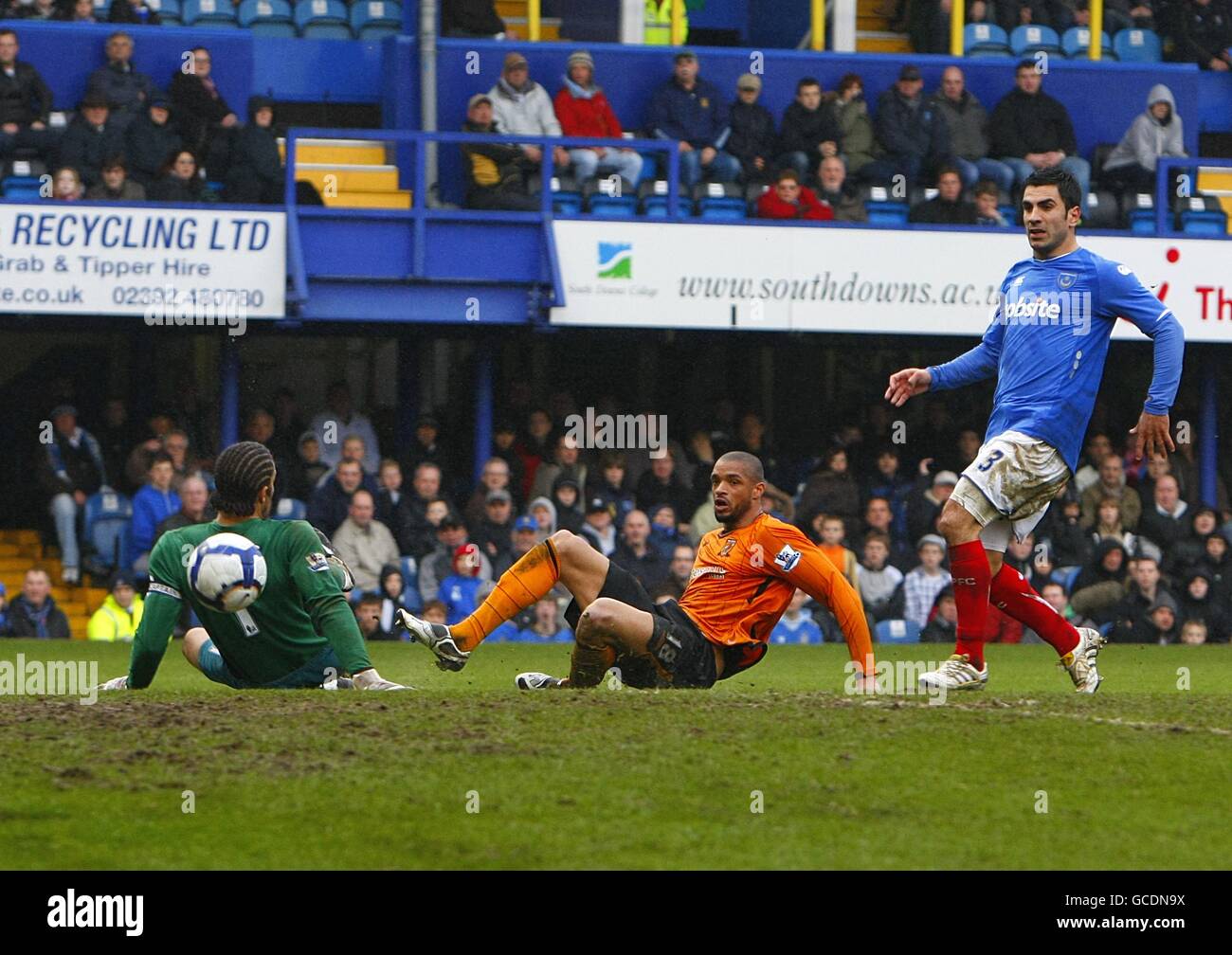 Hull City's Caleb Folan (centre) scores their second goal past ...