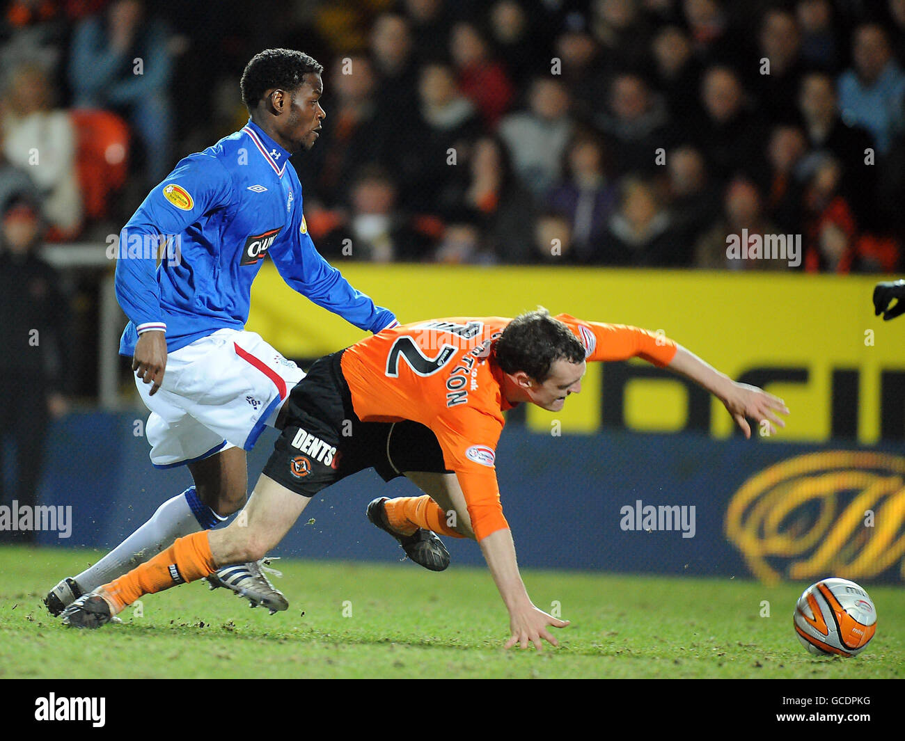 Rangers' Maurice Edu and Dundee United's David Robertson battle for the ...