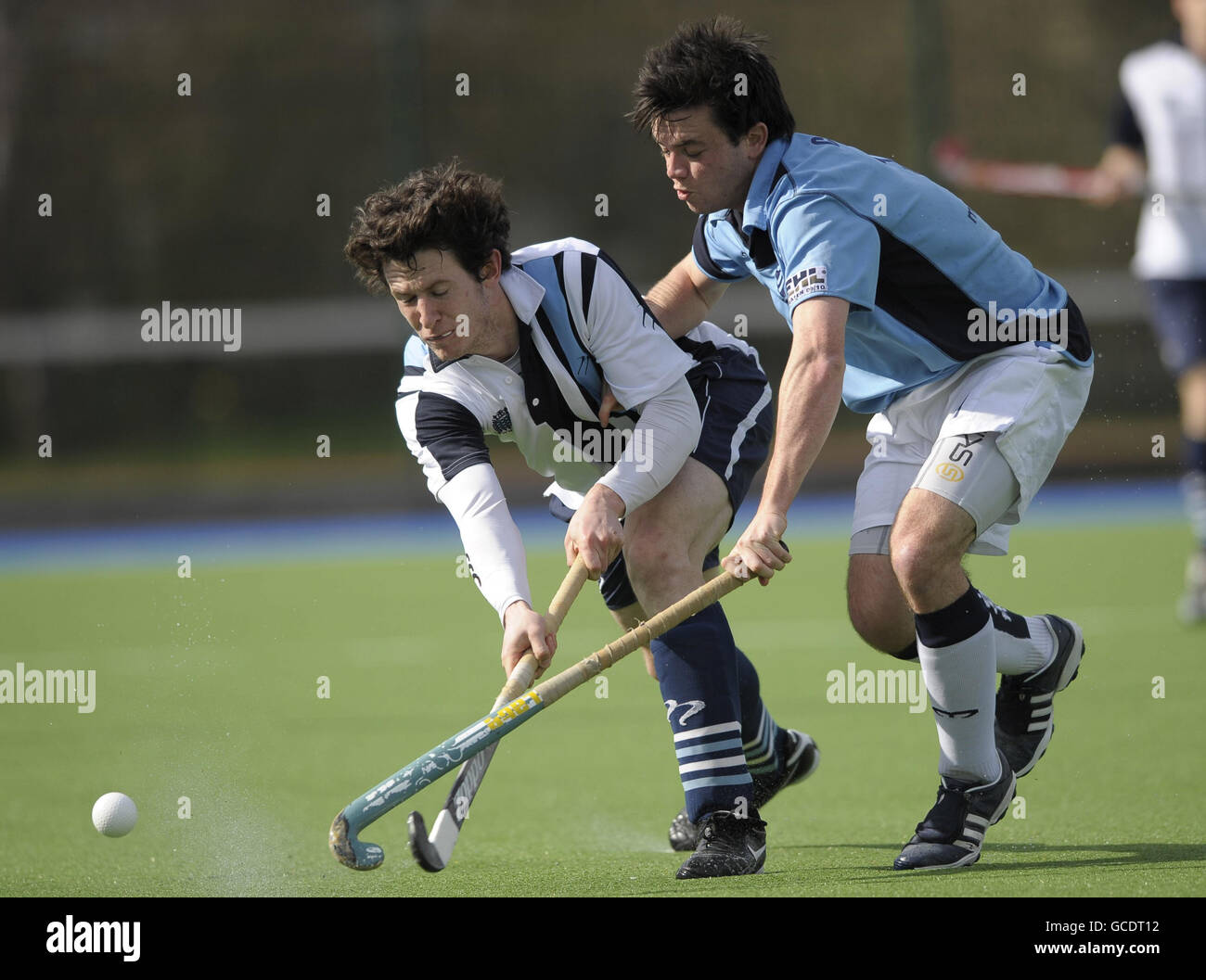 Hampstead's Daniel Walsh gets away from Reading's Jon Codling (right ...