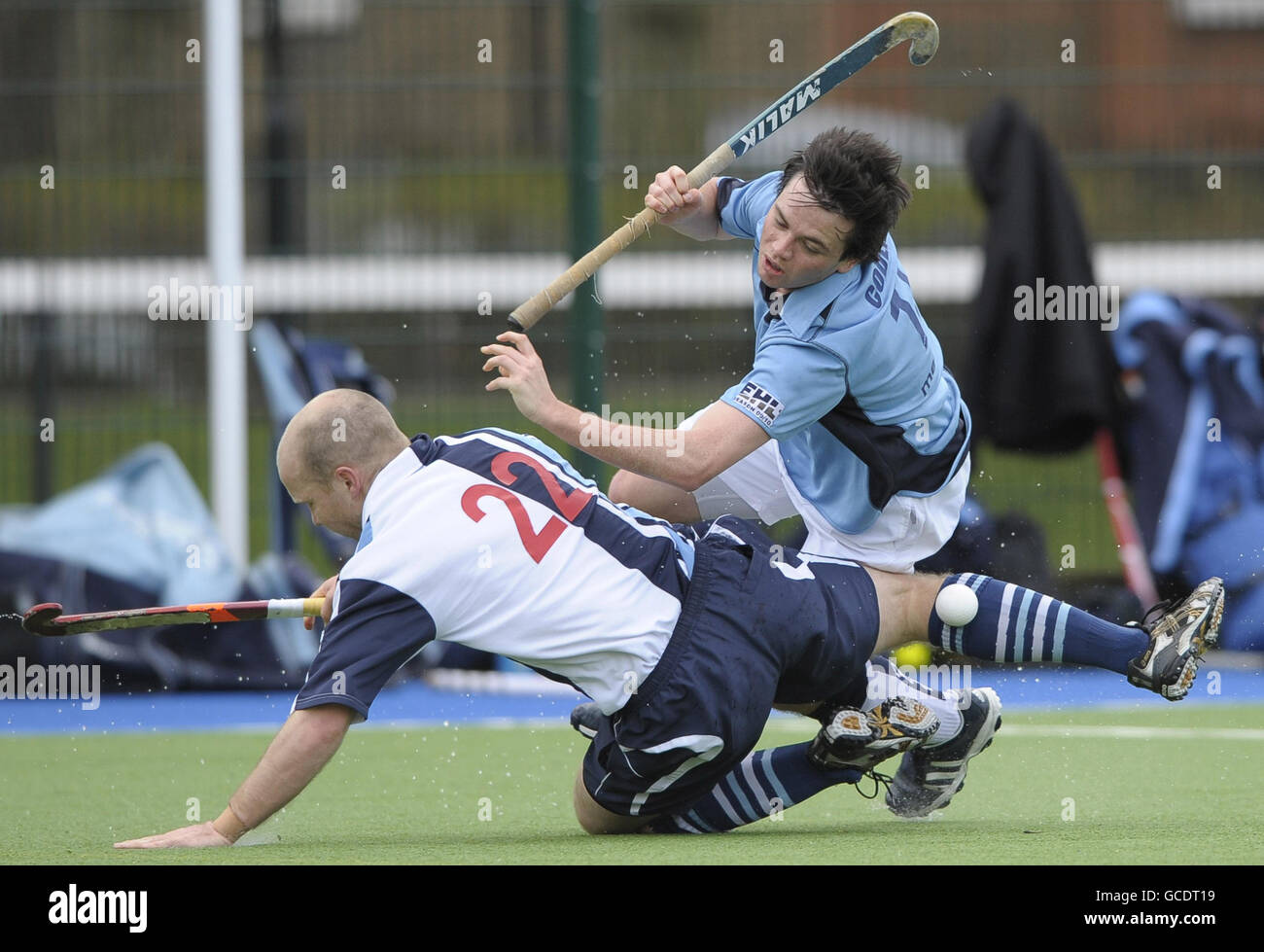 Hampstead's Peter Swainson (left) challenges Reading's Jon Codling ...