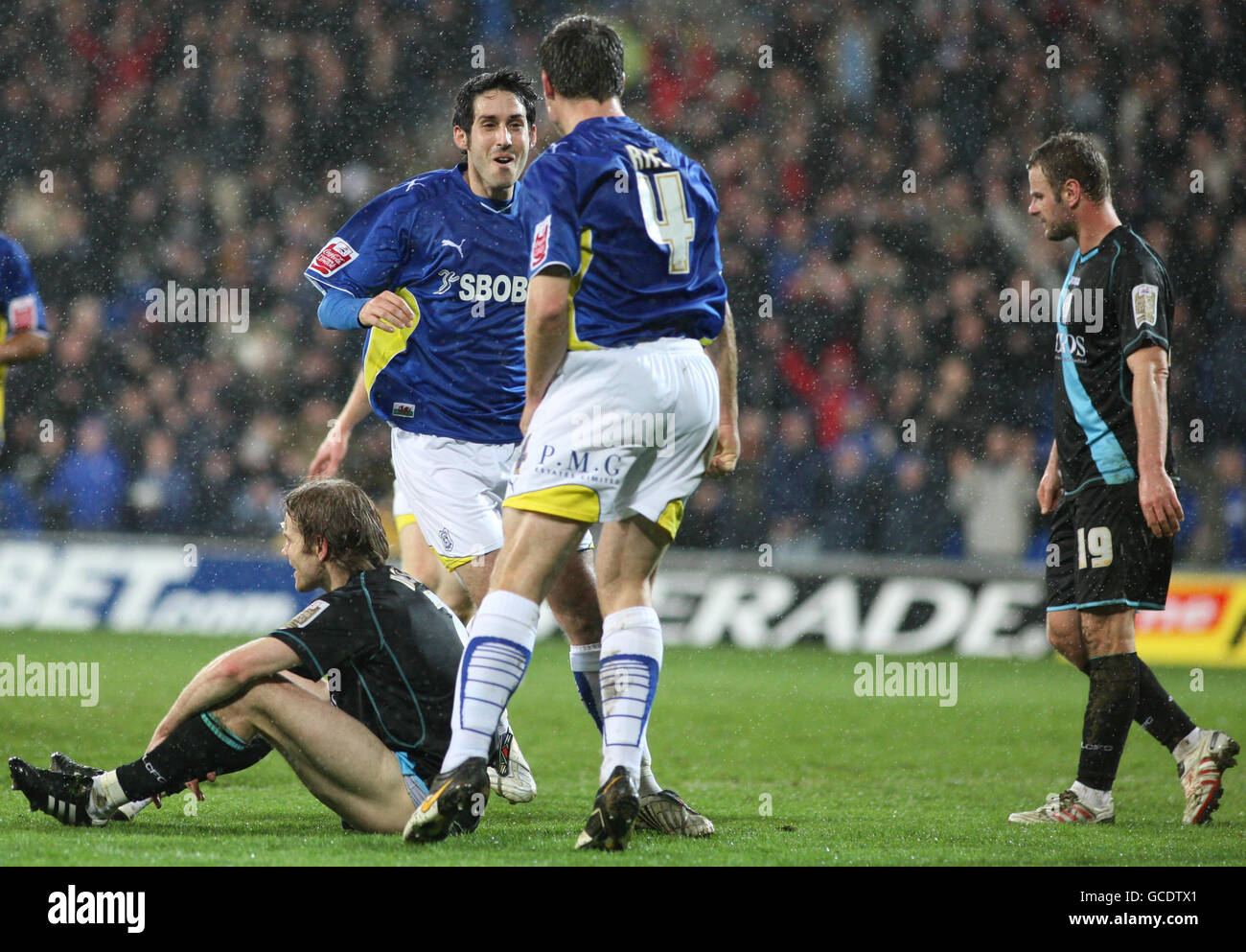 Cardiff City's Peter Whittingham (second left) celebrates with Gavin ...