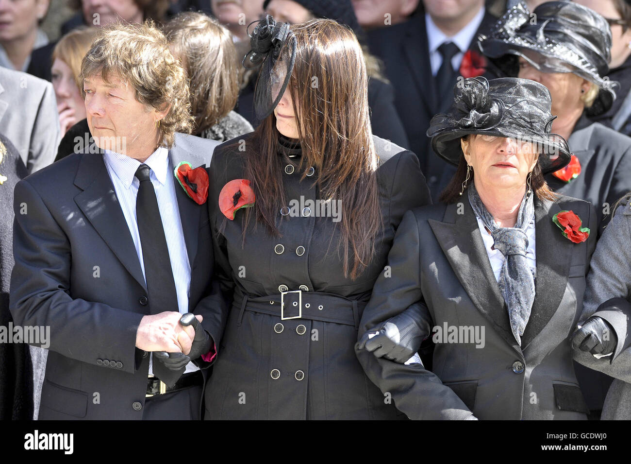 Charlotte Fox (centre), widow of Sergeant Paul Fox from 28 Engineer ...