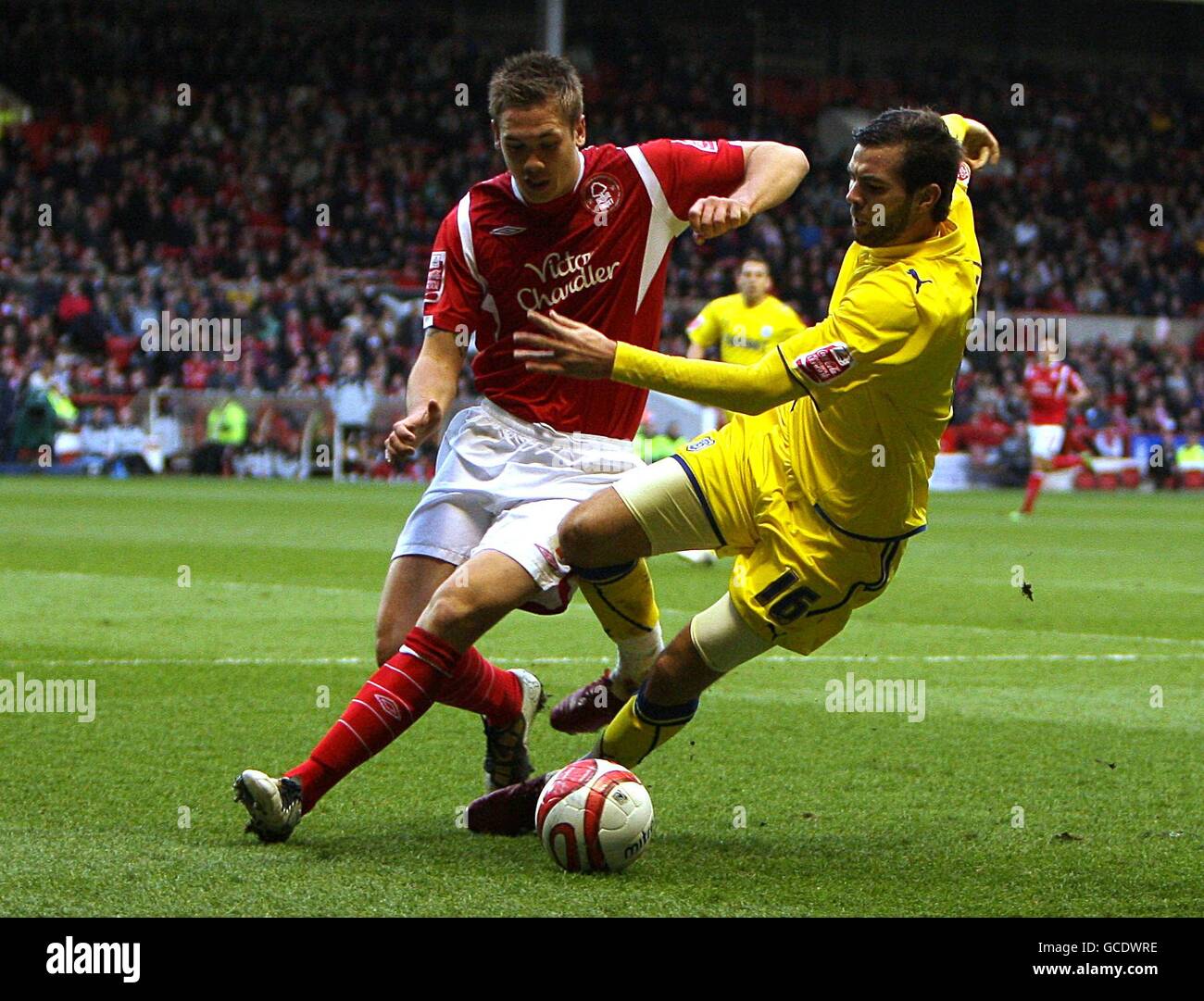 Nottingham Forest's Luke Chambers and Cardiff City's Joe Ledley battle ...