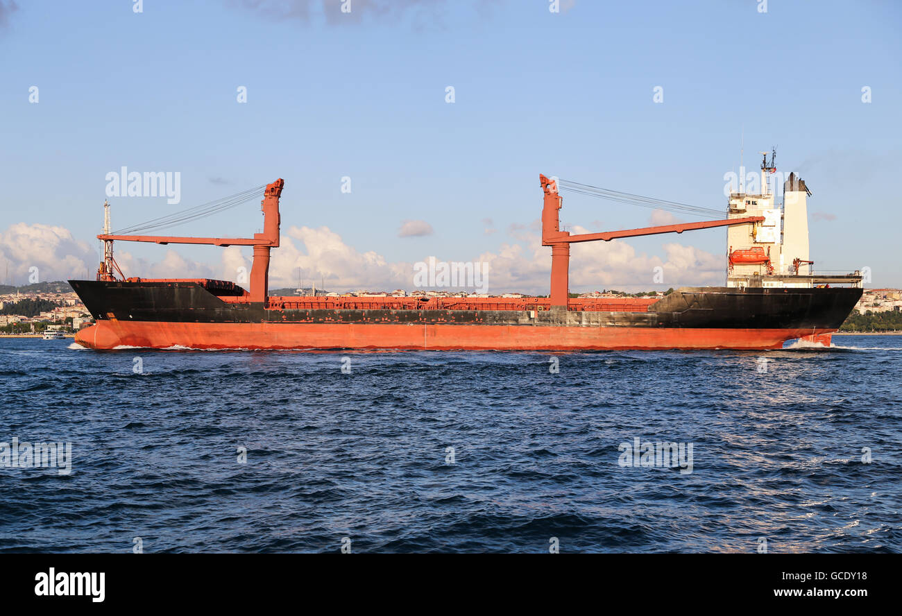 A cargo ship carrying goods between ports Stock Photo - Alamy