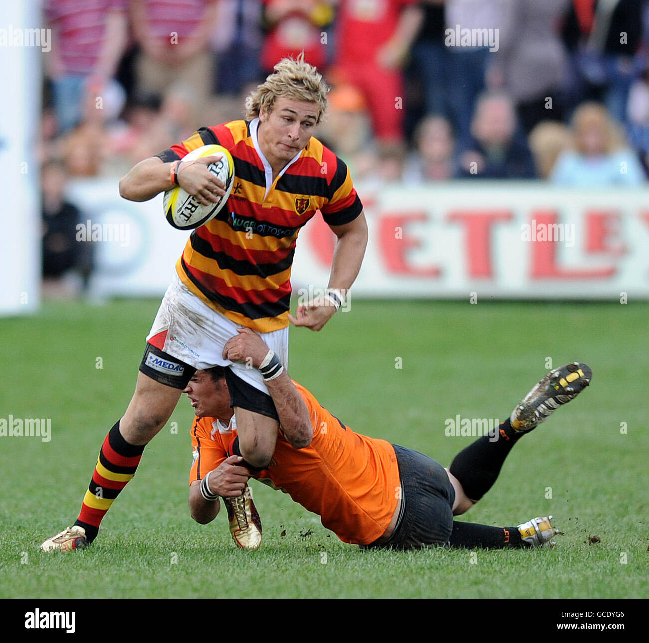 Hamilton's Stefan Du Toit (left) gets away from University of ...
