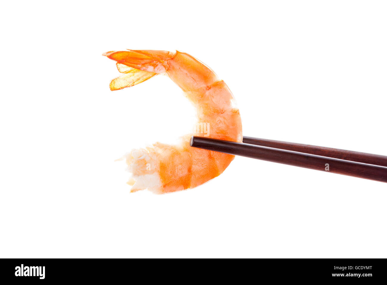 Delicious shrimp eating. Cooked prawn eating with chopsticks. Culinary ...