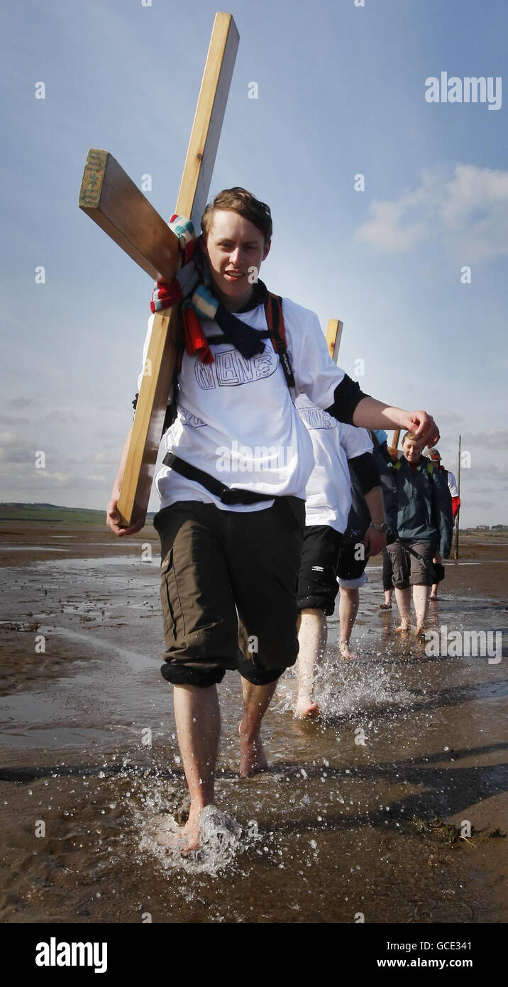 Pilgrims walk with crosses on the final leg of the Northern Cross ...