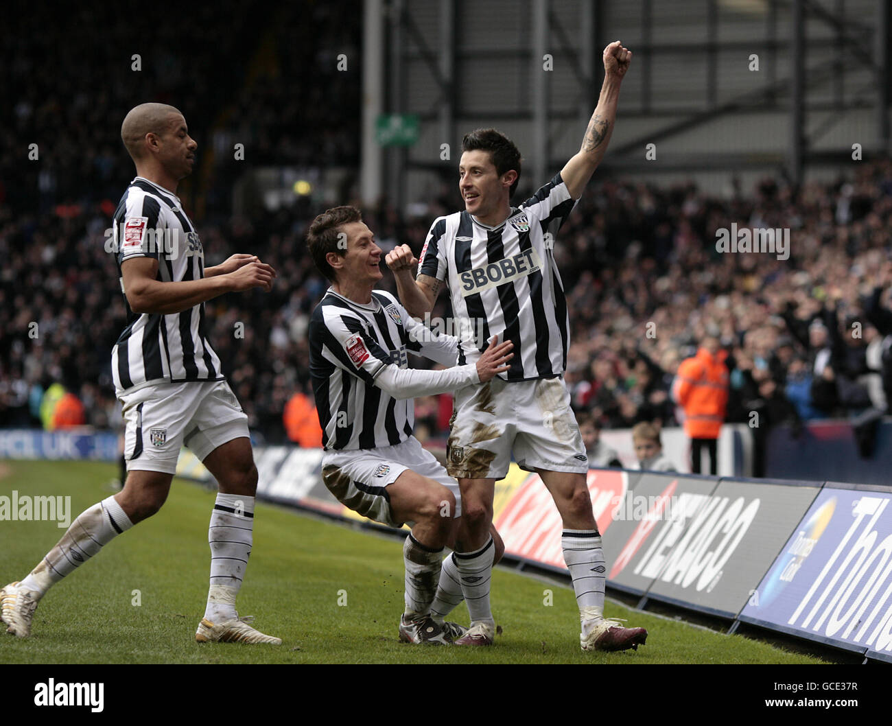 West Bromwich Albion's Robert Koren (R) celebrates scoring his sides ...