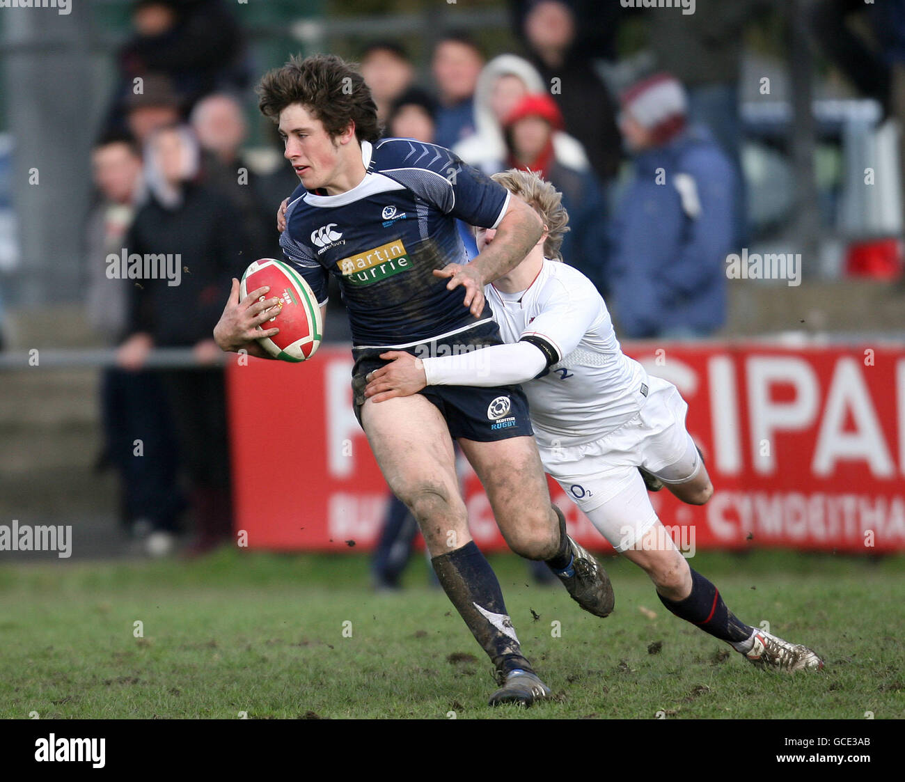 Scotland's Jamie Stevenson tries to break through the England defence ...