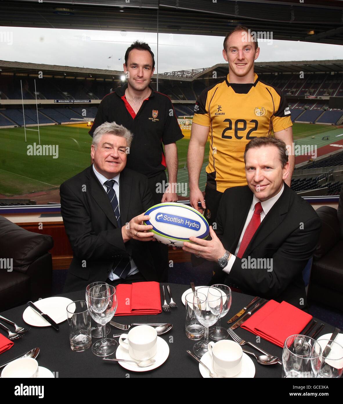 North Berwick's Cameron Ewer (back left), SRU President Jim Stevenson ...