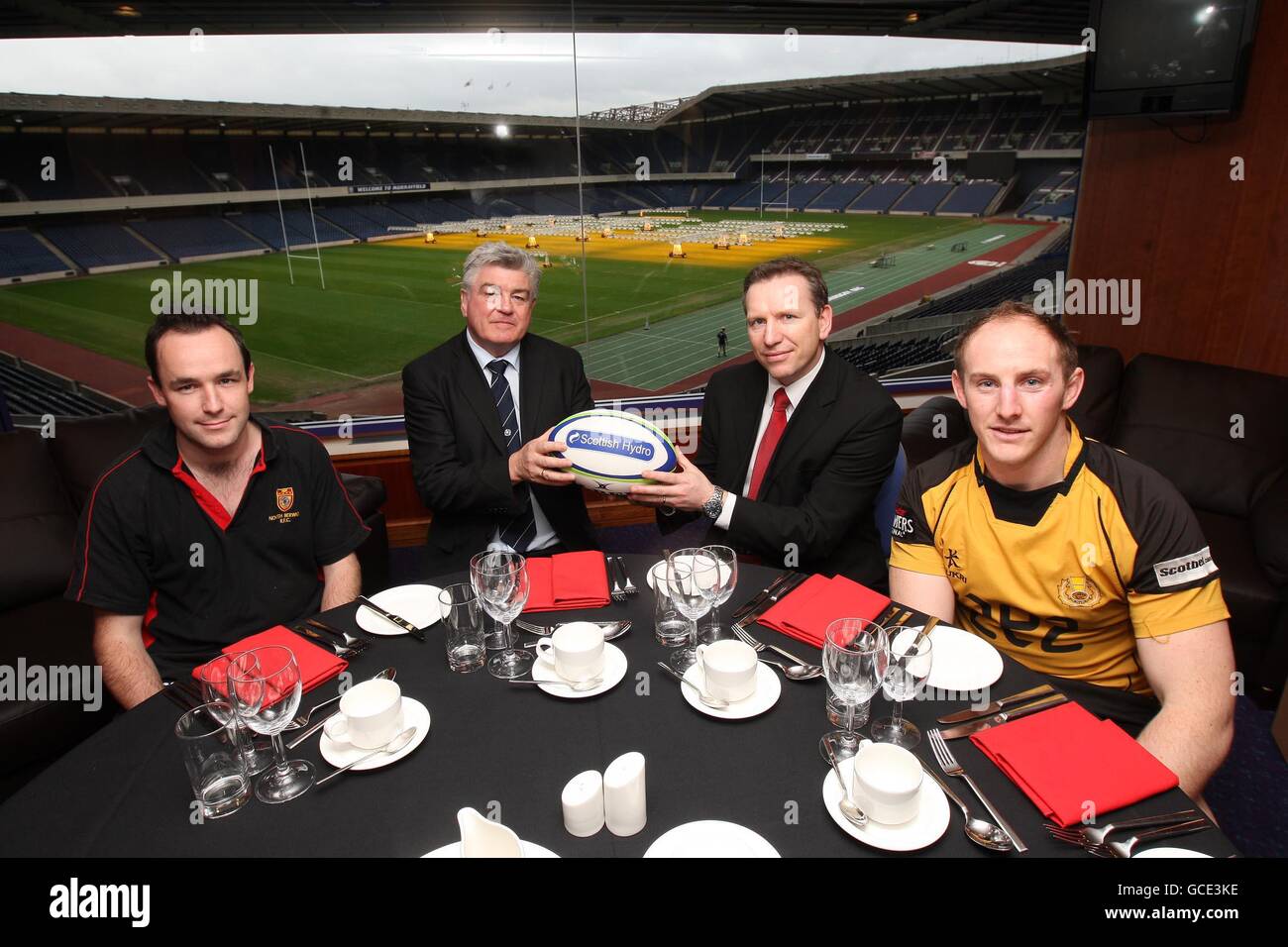North Berwick's Cameron Ewer (left), SRU President Jim Stevenson ...