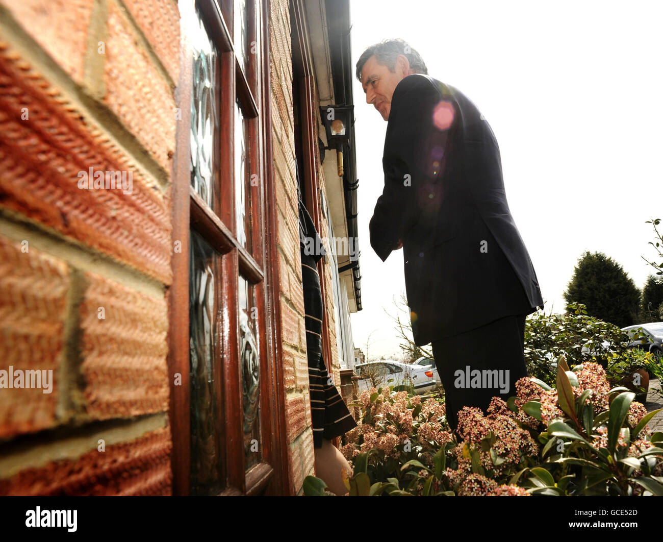 Prime Minister Gordon Brown and his wife Sarah are invited into the ...