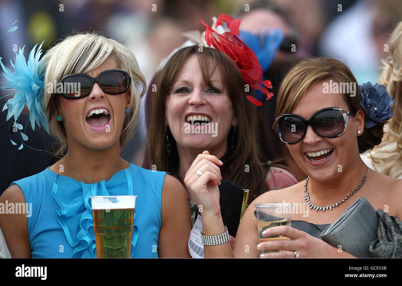 Racegoers during Aintree Ladies Day of the Grand National meeting at ...
