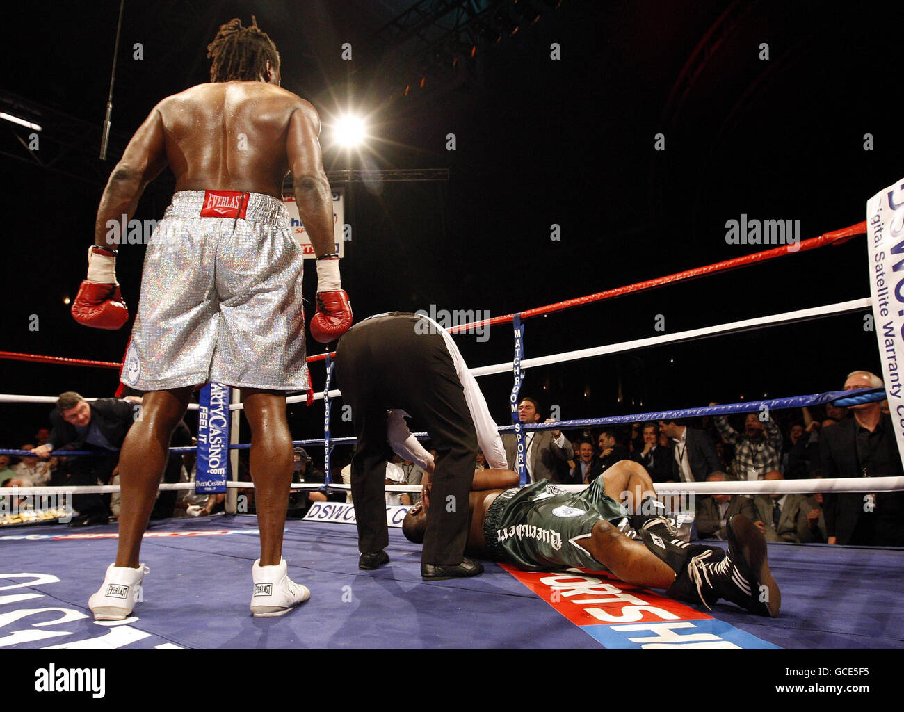 Michael Sprott lays on the floor after being knocked out by Audley ...