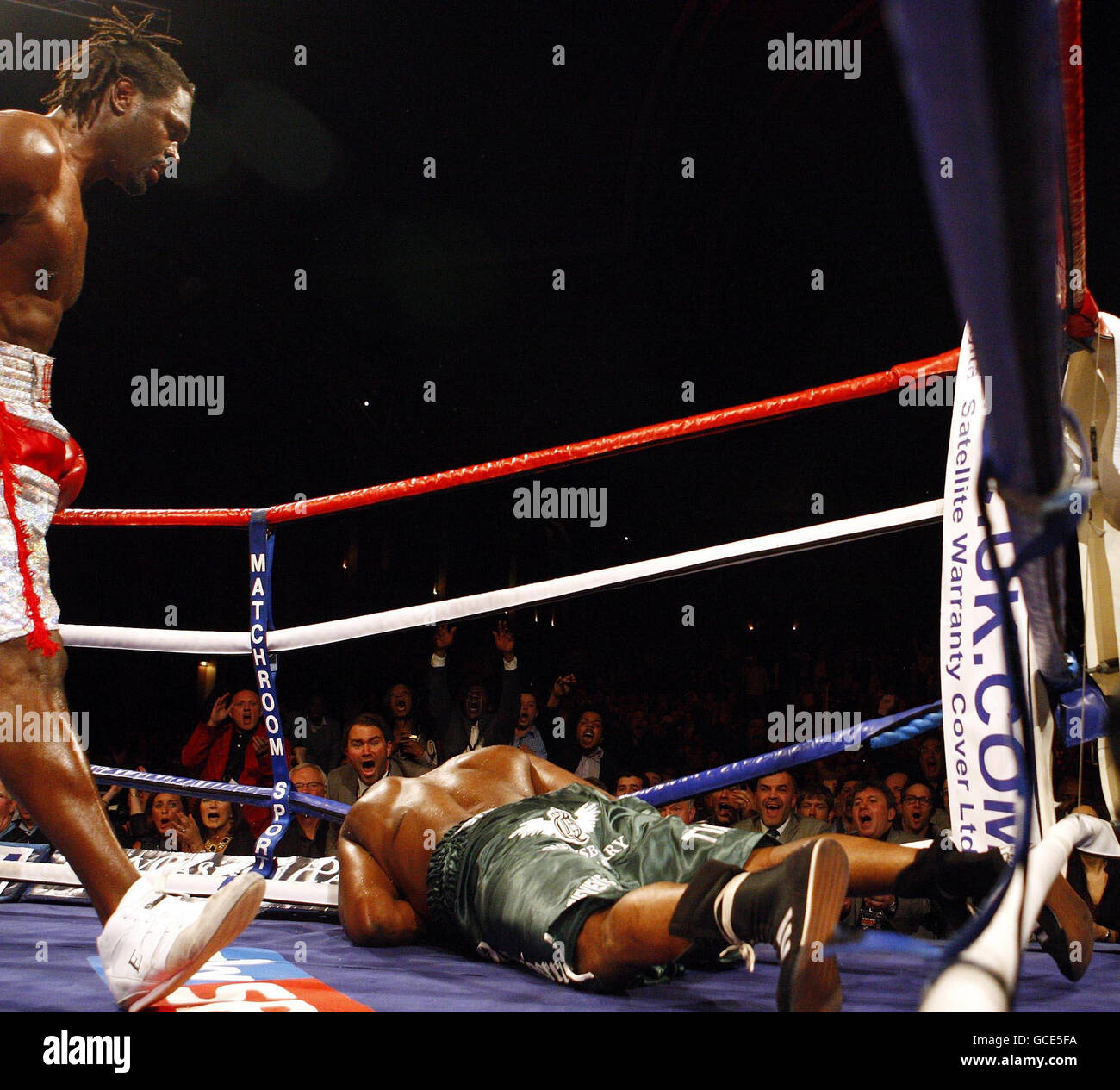 Michael Sprott lays on the floor after being knocked out by Audley ...