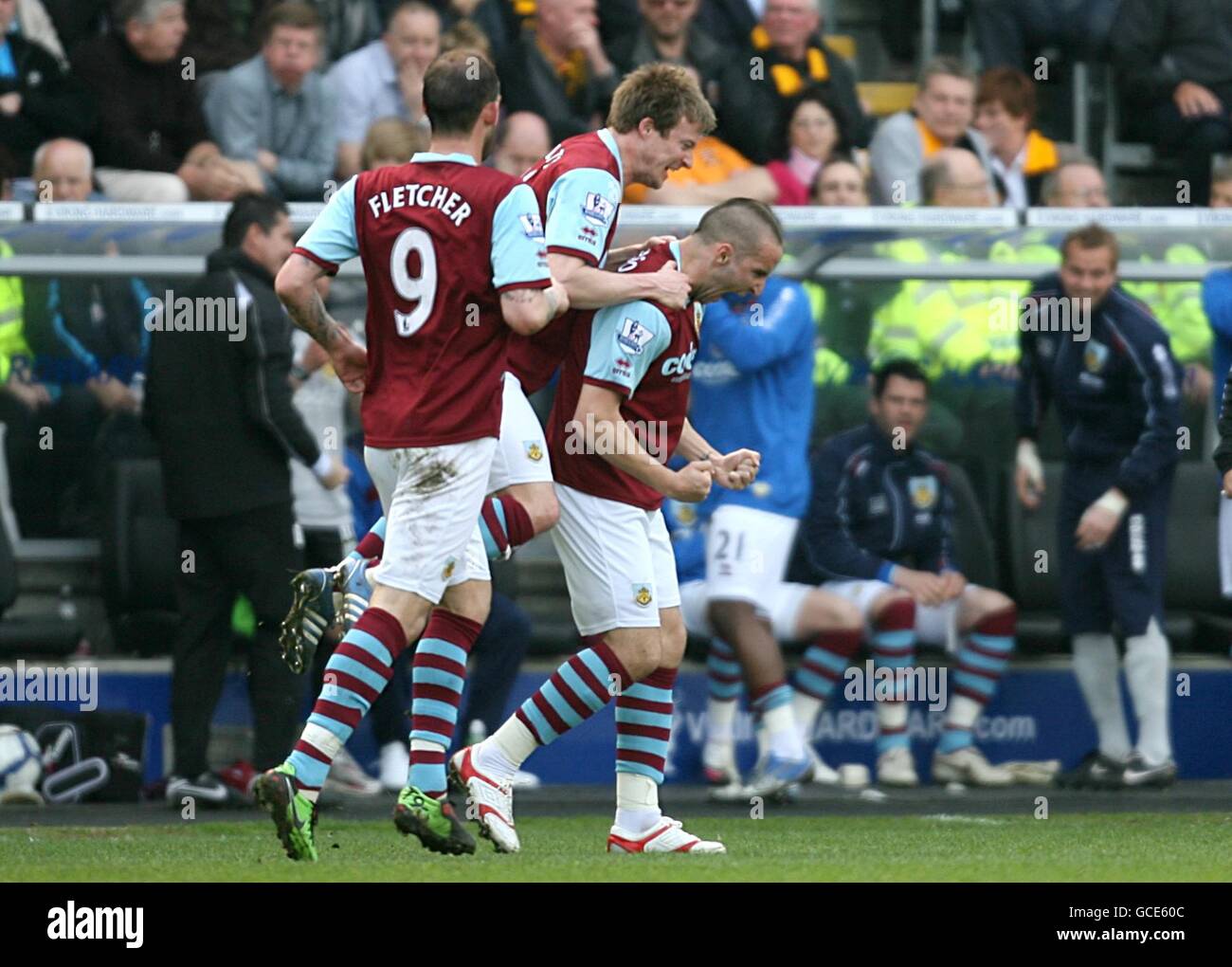 Burnley's Martin Paterson (right) celebrates scoring with his teammates ...