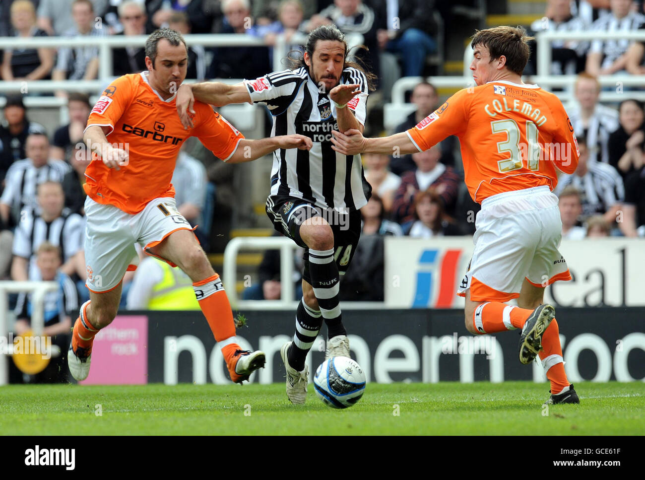 Soccer newcastle full length tackling mangsm datacoapplies hi-res stock ...