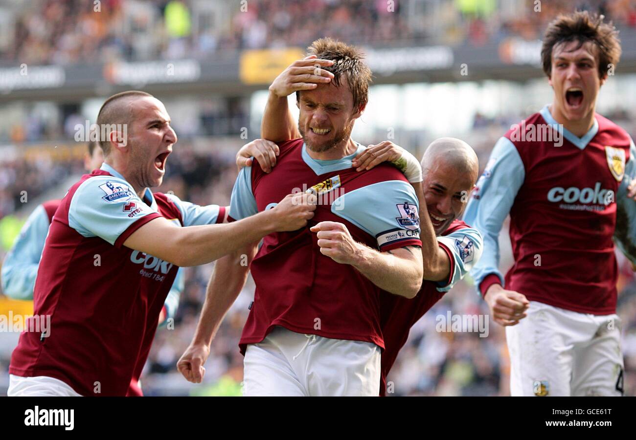 Burnley's Graham Alexander (centre) celebrates scoring his sides second ...