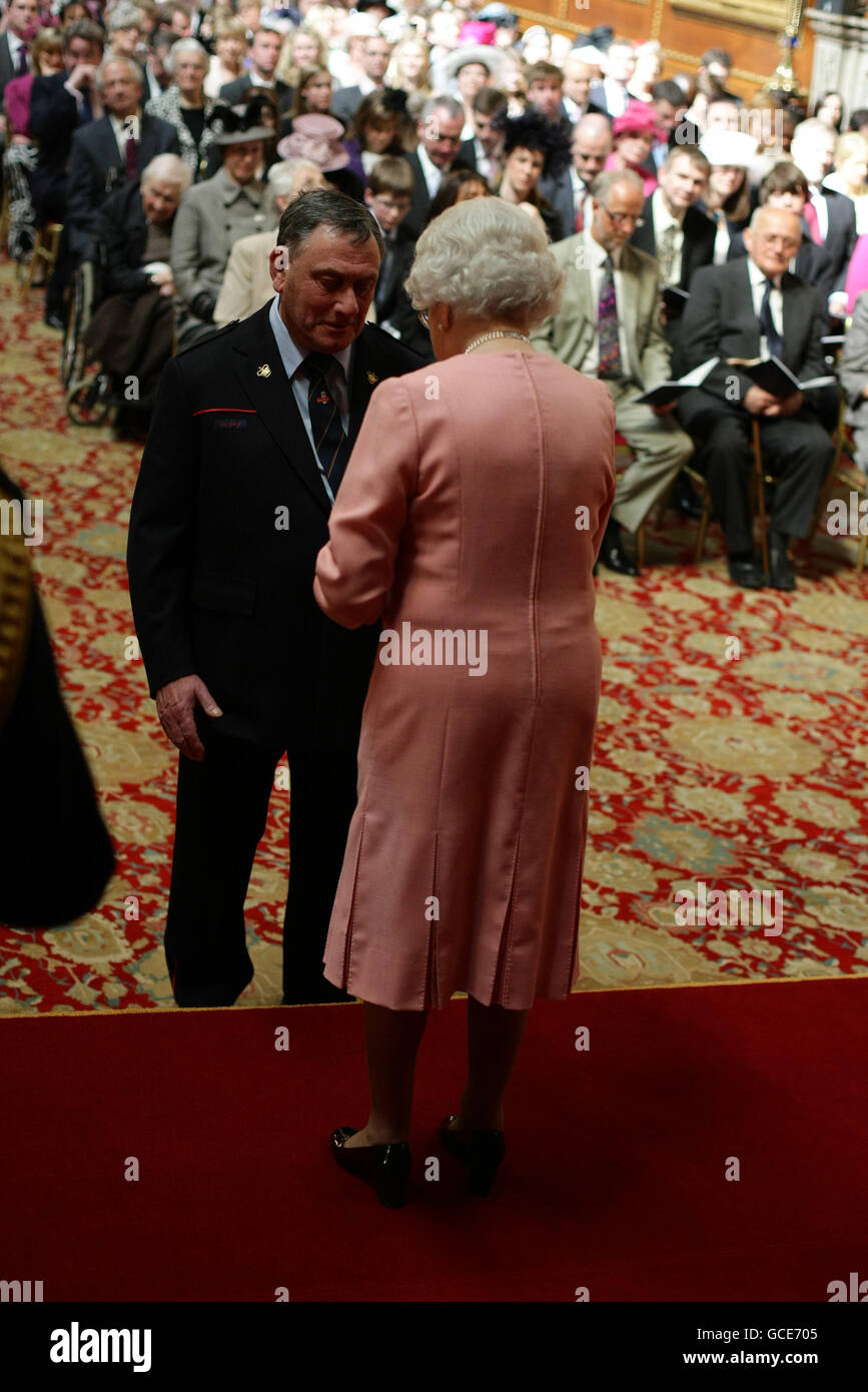 Mr. Peter Armitage is made an MBE by The Queen at Windsor Castle Stock ...