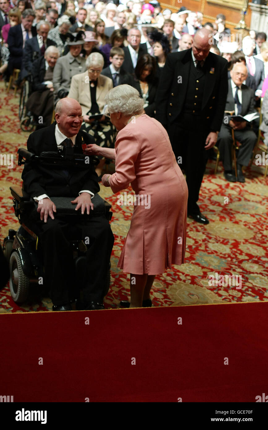 Mr. Philip Mason from Bordon is made an MBE by The Queen at Windsor ...