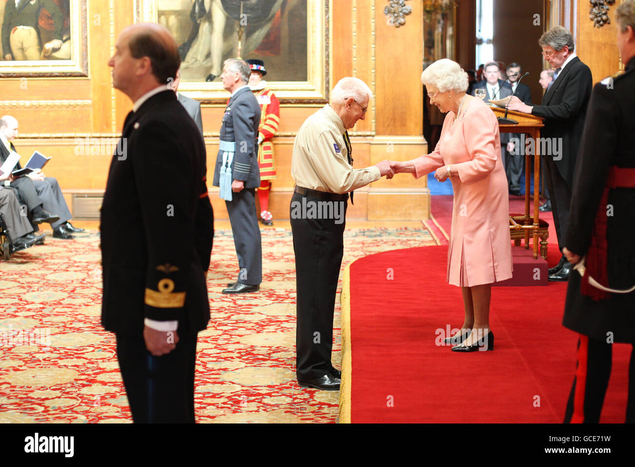 Mr. Alan Beavis from Reading is made an OBE by The Queen at Windsor ...