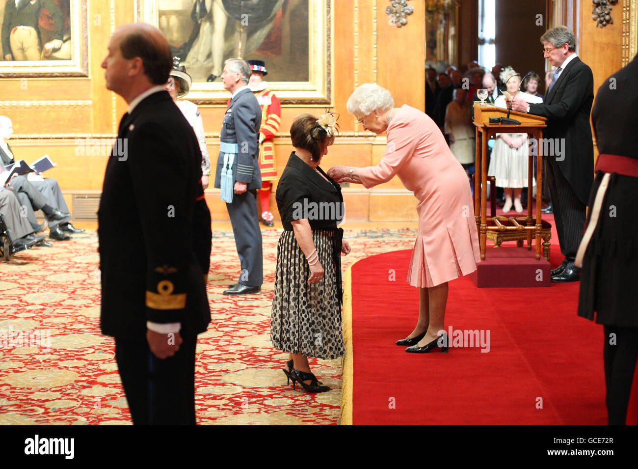 Mrs Ann Parr from Reading is made an MBE by The Queen at Windsor Castle ...