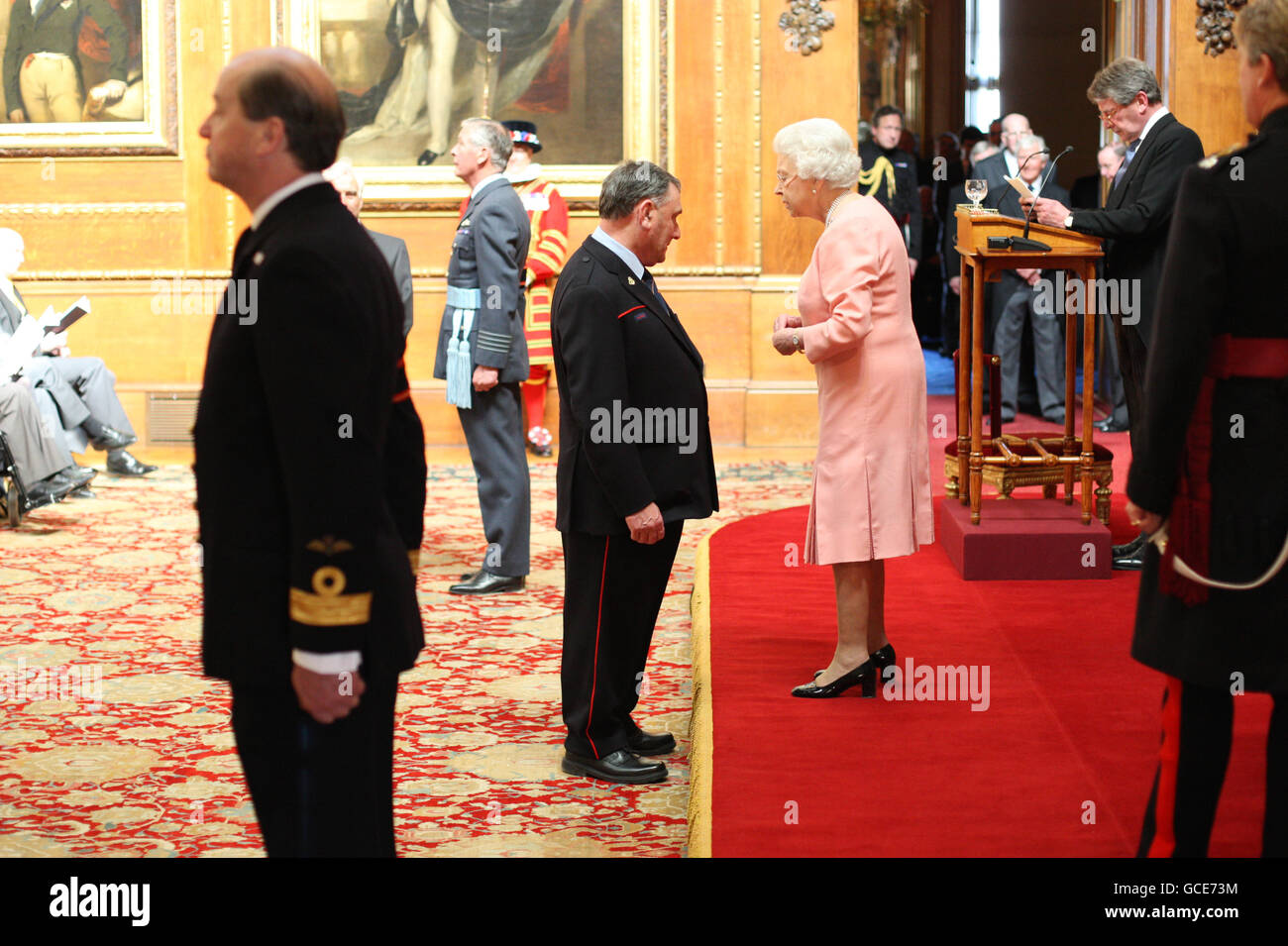 Mr. Peter Armitage is made an MBE by The Queen at Windsor Castle Stock ...