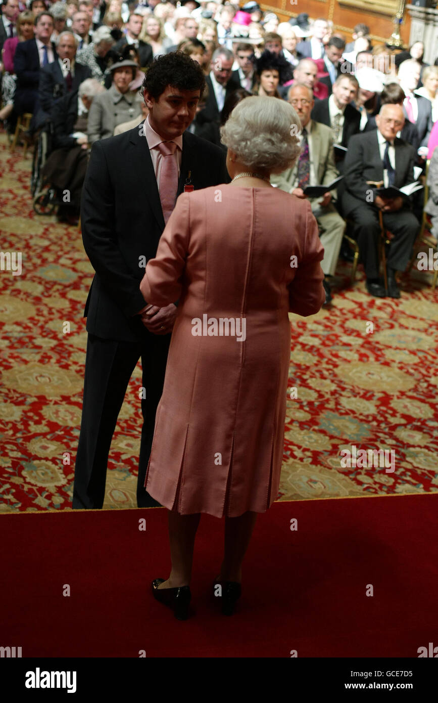 Mr. Christopher Kealey is made an MBE by The Queen at Windsor Castle ...