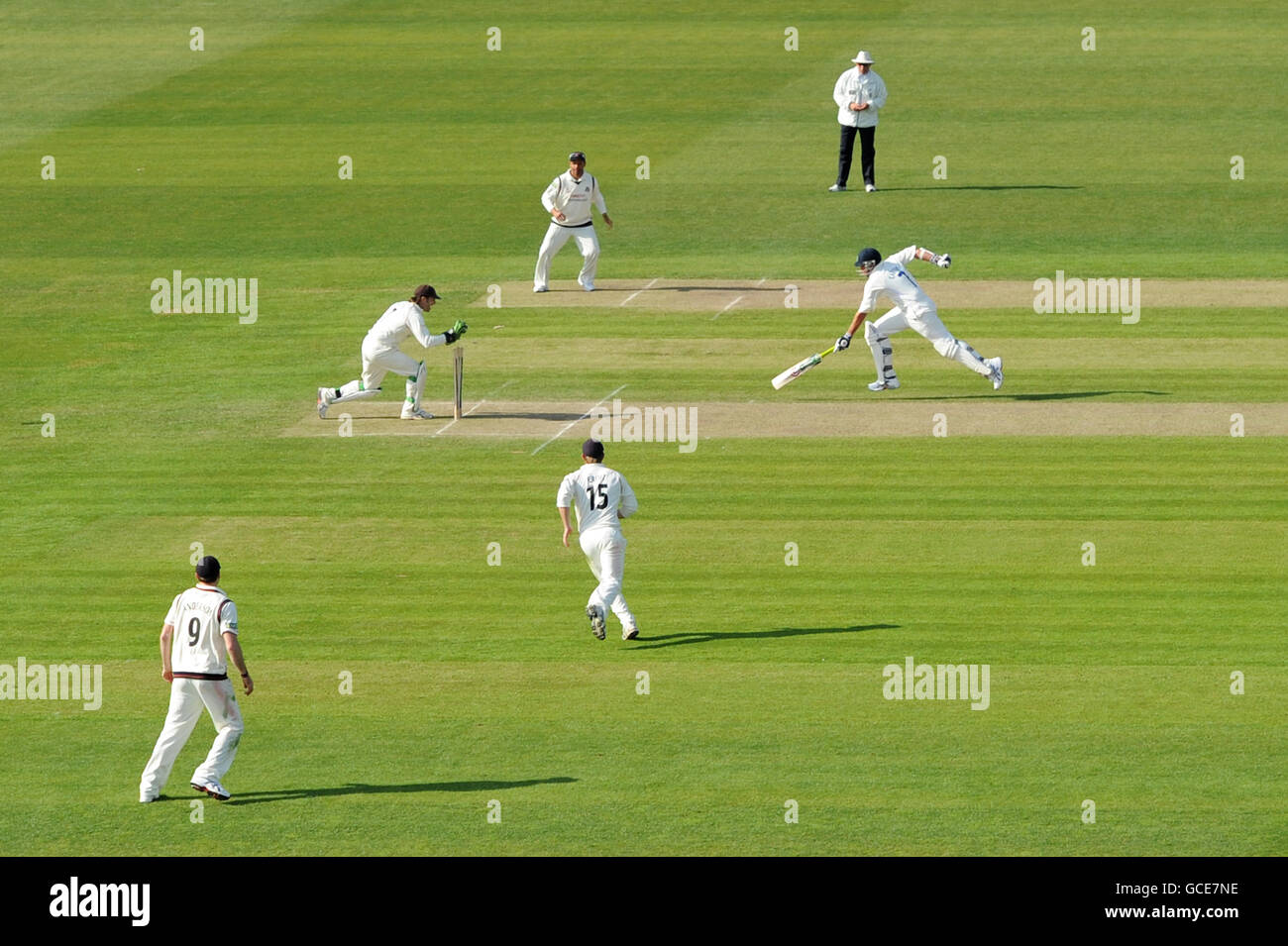 Warwickshire's Neil Carter (centre) is run out by Lancashire ...