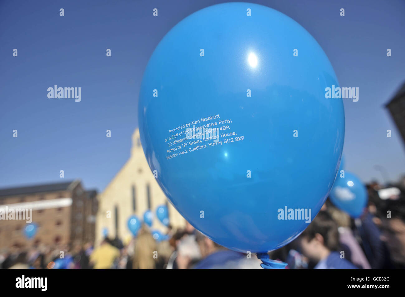 Conservative campaign balloons are held aloft as Conservative Party ...