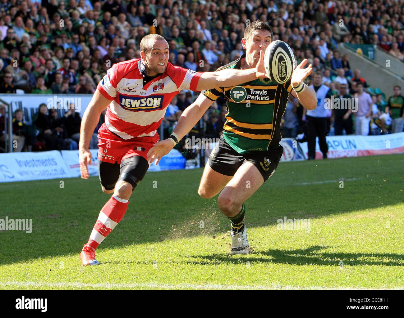 Northampton Saints' James Downey (right) and Gloucester's Charlie ...
