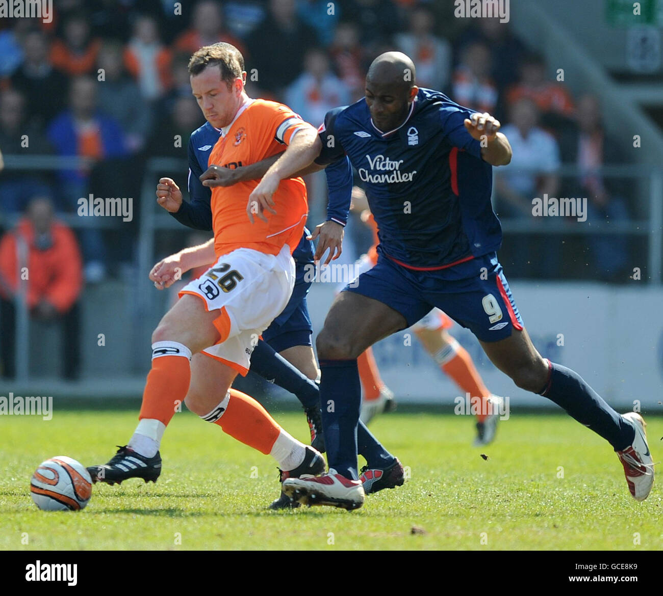 Blackpool's Charlie Adam and Nottingham Forest's Dele Adebola (right ...