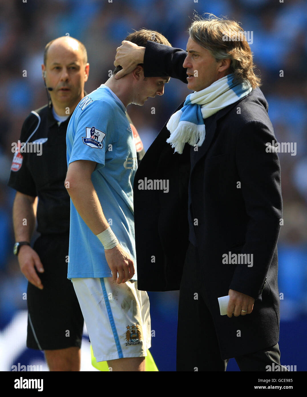 Manchester city manager roberto mancini and adam johnson hi-res stock ...
