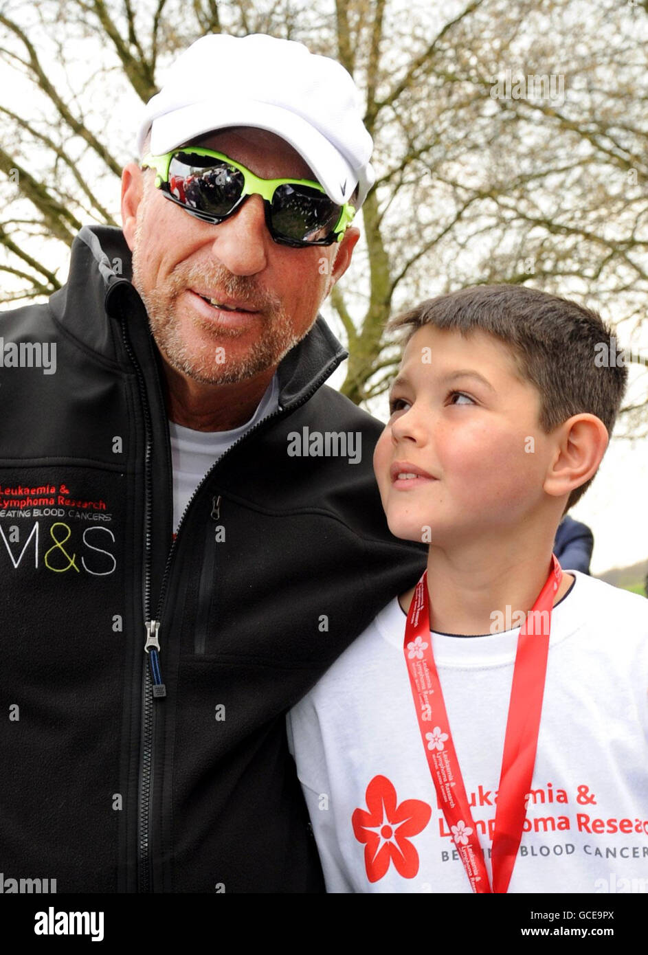 Sir Ian Botham in Hyde Park, London with Joe Smale, 12, from Chiswick ...