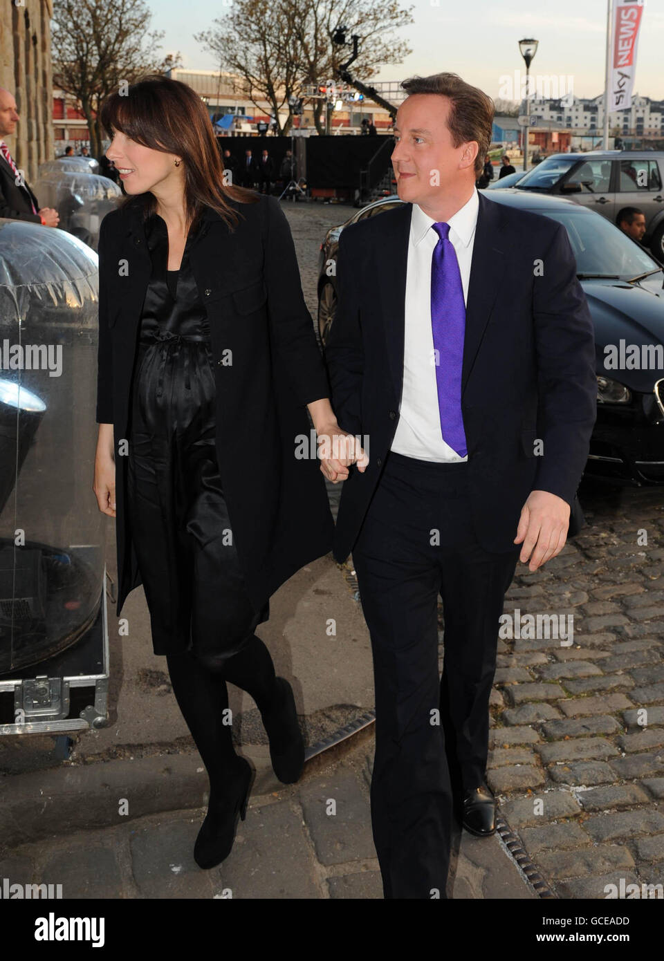Conservative leader David Cameron arrives with his wife, Samantha, to ...