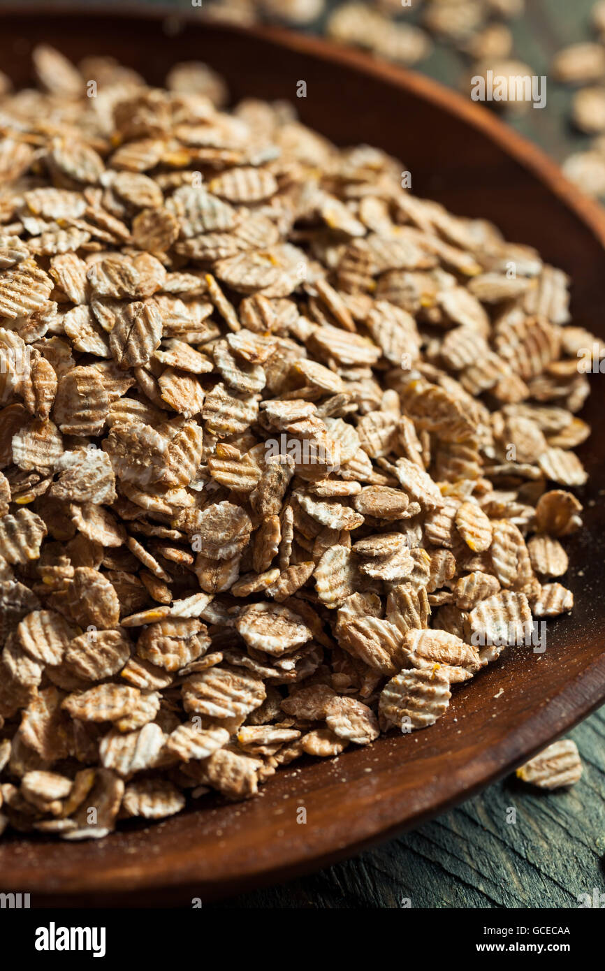 Organic Rolled Rye Flakes in a Bowl Stock Photo - Alamy