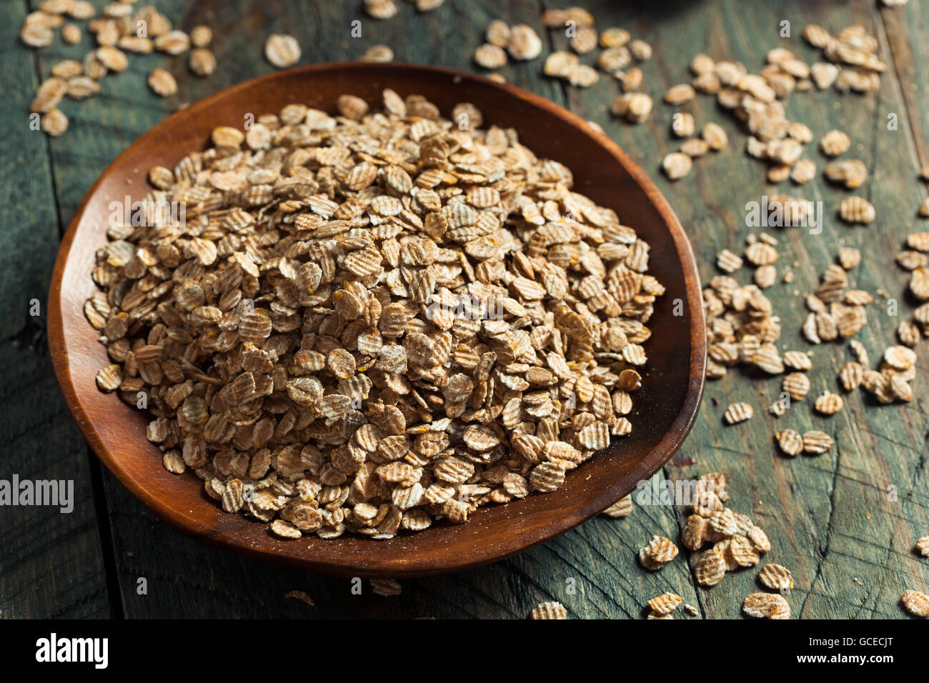 Organic Rolled Rye Flakes in a Bowl Stock Photo - Alamy